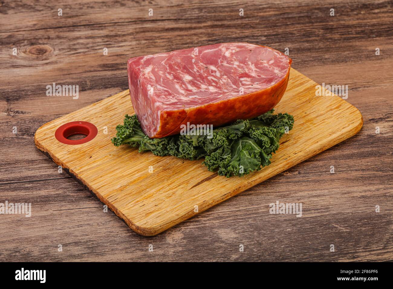 Tasty Beef ham piece over board Stock Photo - Alamy