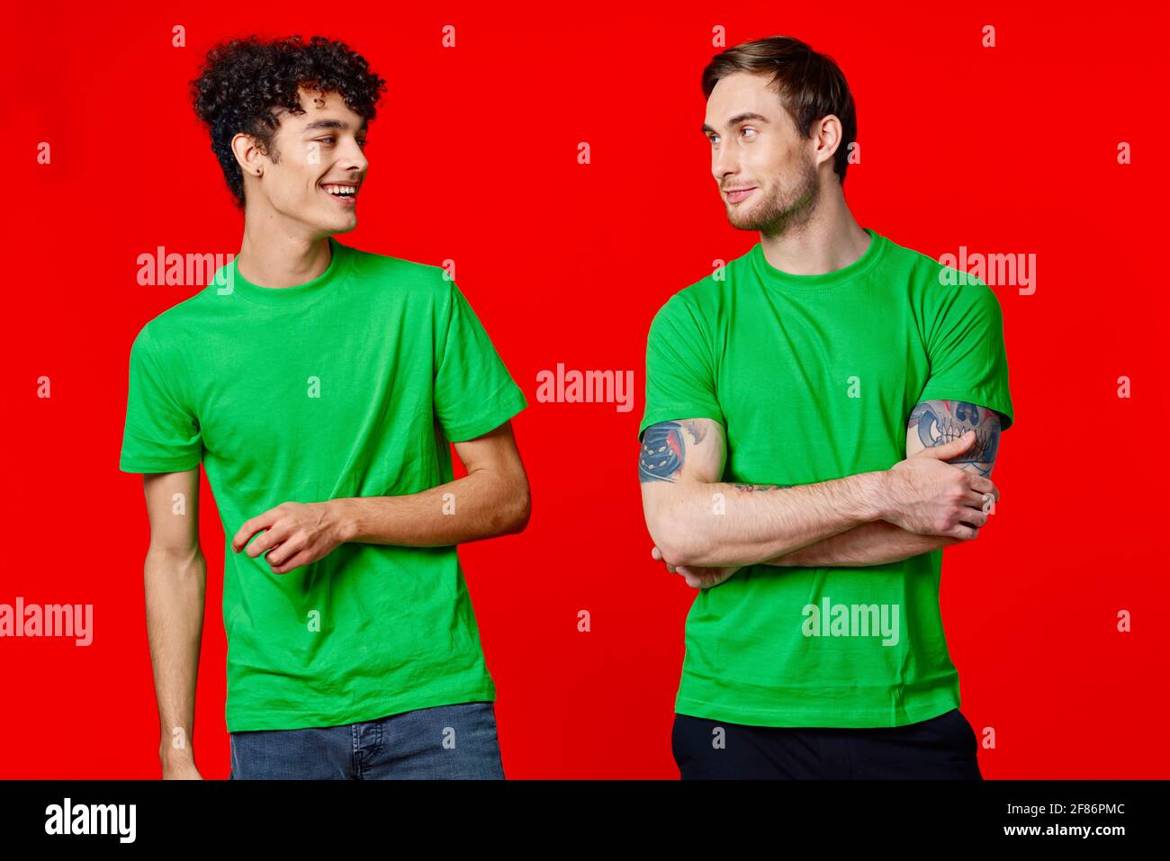 two friends greetings communication emotions red background Stock Photo ...