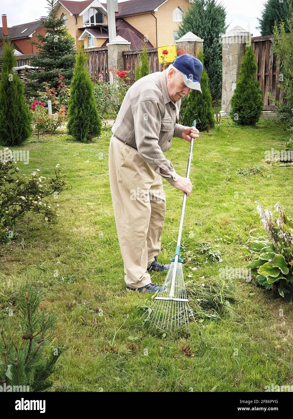 Senior janitor hi-res stock photography and images - Alamy