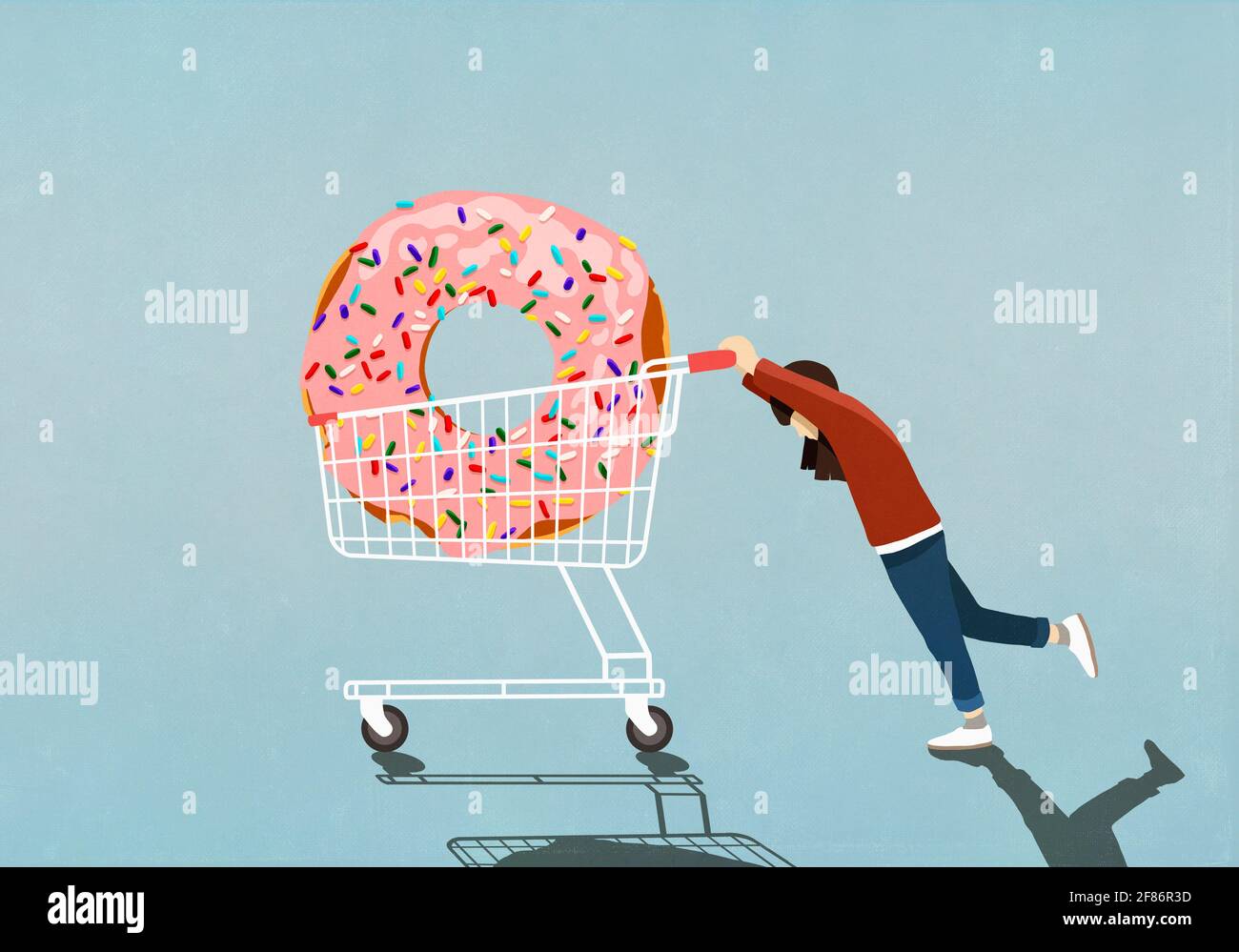 Girl pushing large sprinkle donut in shopping cart Stock Photo - Alamy