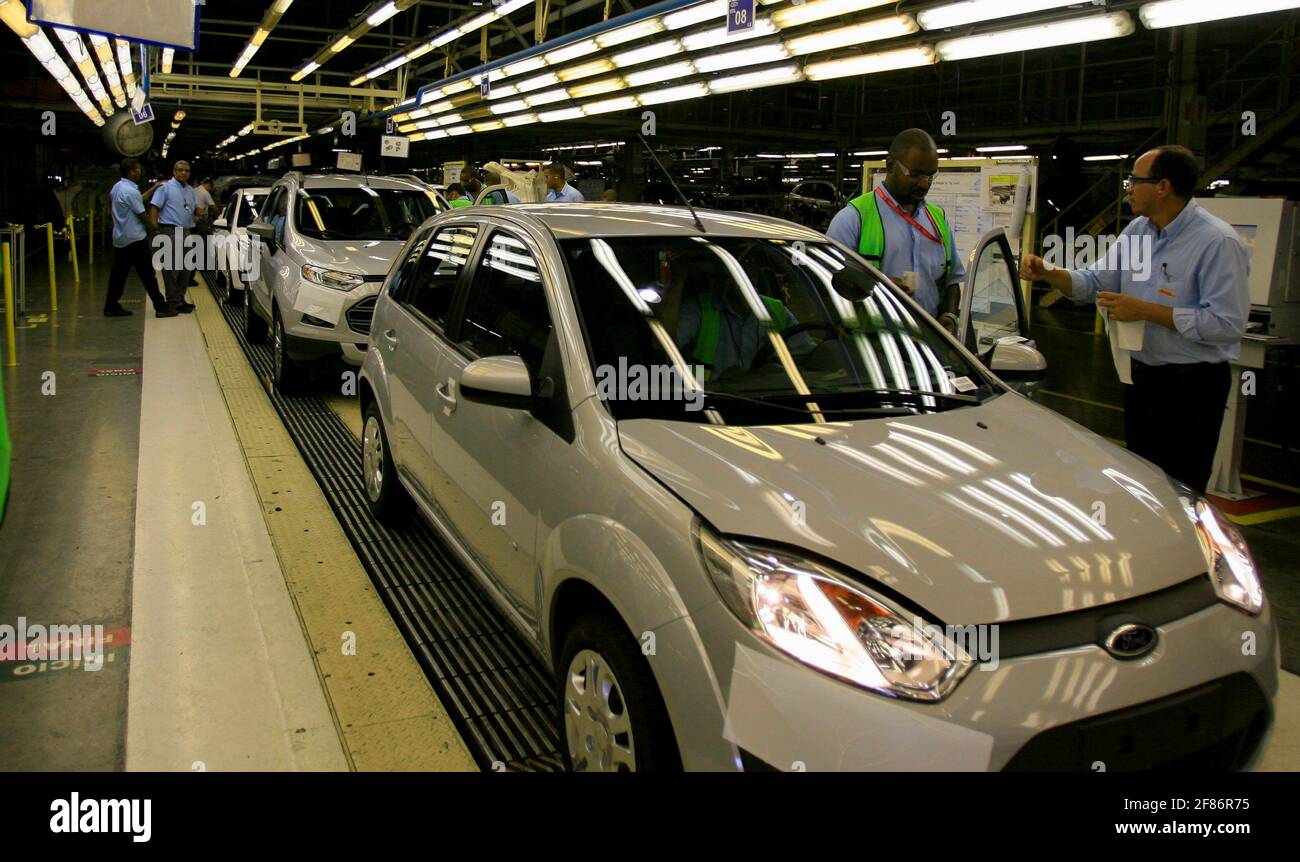 salvador, bahia / brazil - december 12, 2013: employees are seen at ...