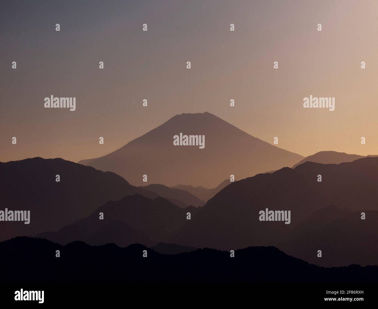 Silhouetted Mount Fuji at sunrise, Fuji-Hakone-Izu National Park, Japan ...
