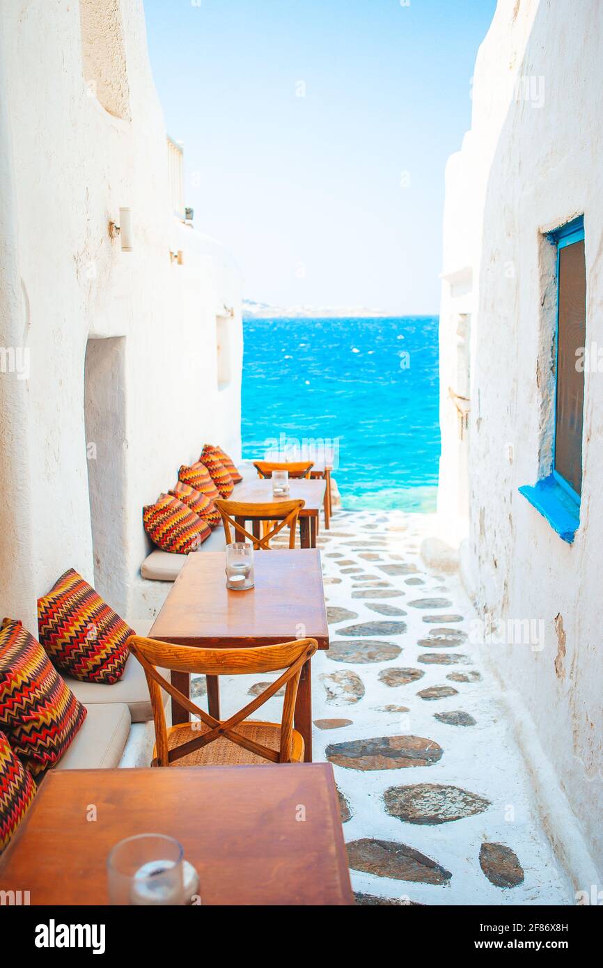 Typical Greek bar in Mykonos town with sea view, Cyclades islands ...