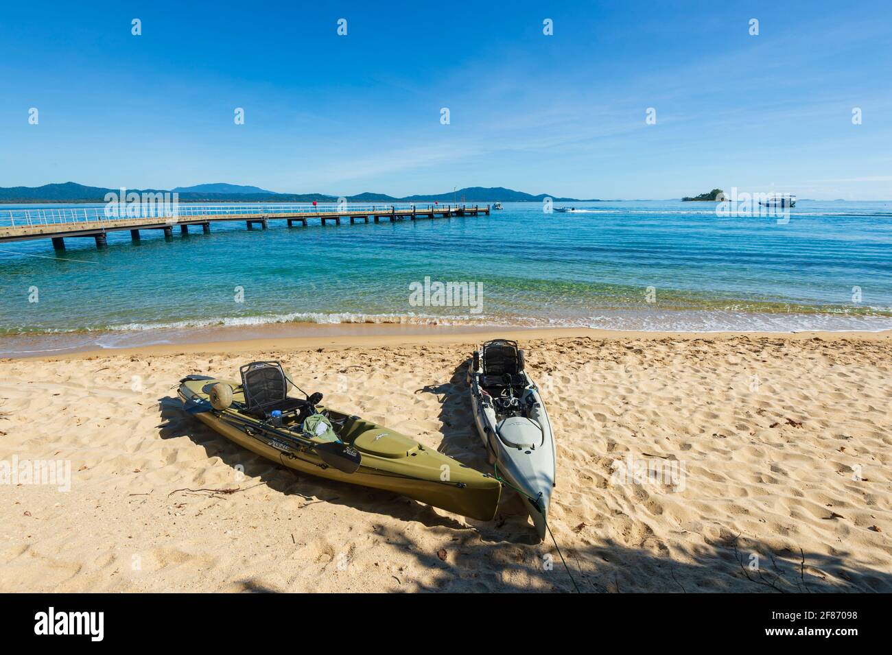 Two kayaks on the beach at Dunk Island, Queensland, QLD, Australia ...