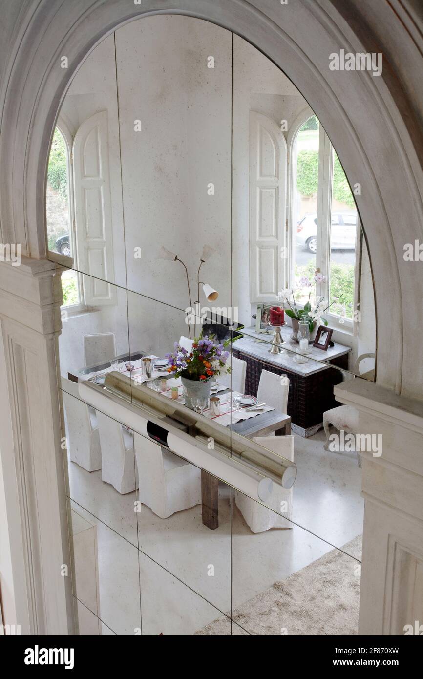 LIving room in a elegant house with table set up Stock Photo - Alamy