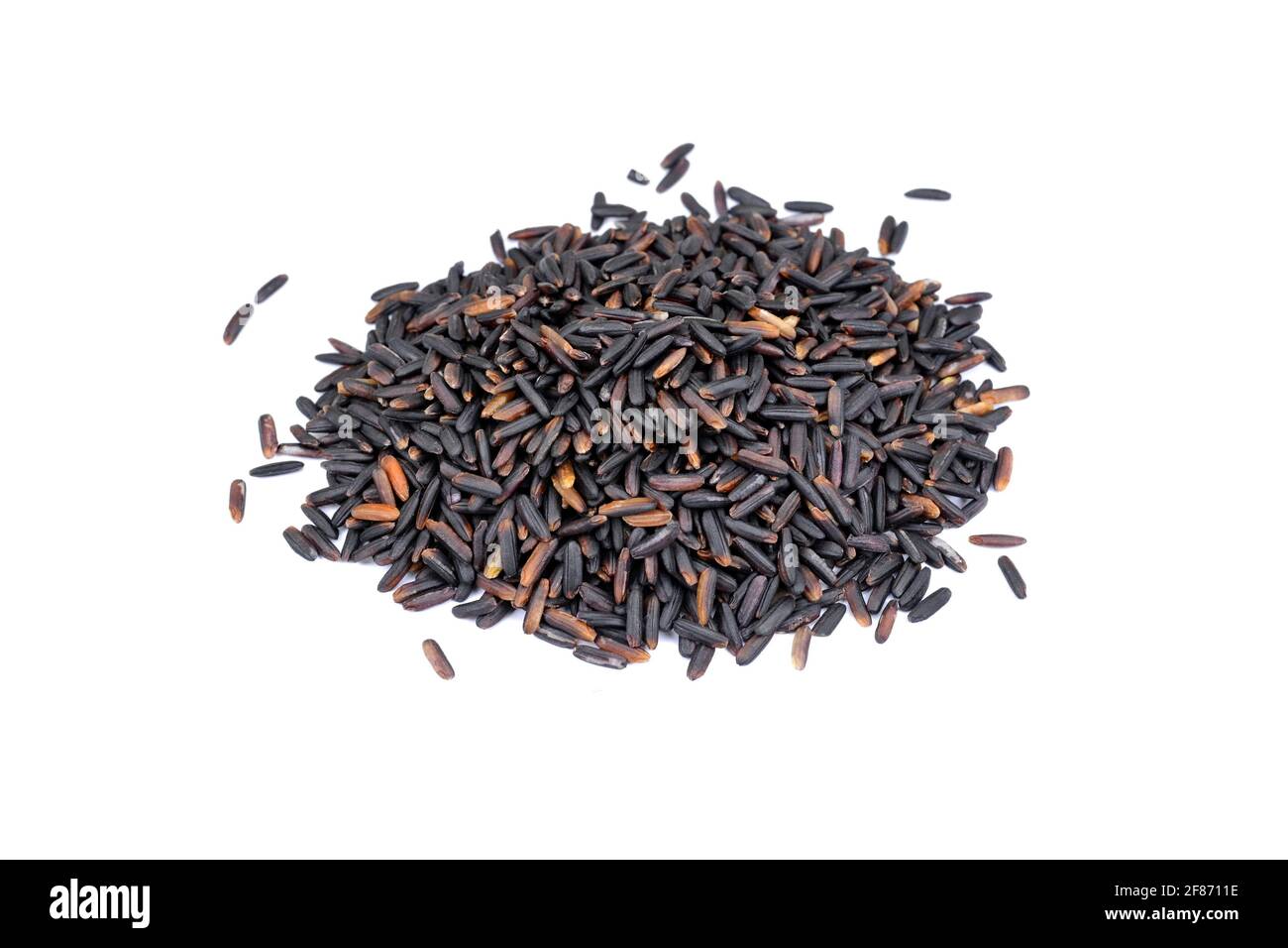 Pile of Brown Rice isolated. Organic black rice isolated on white ...