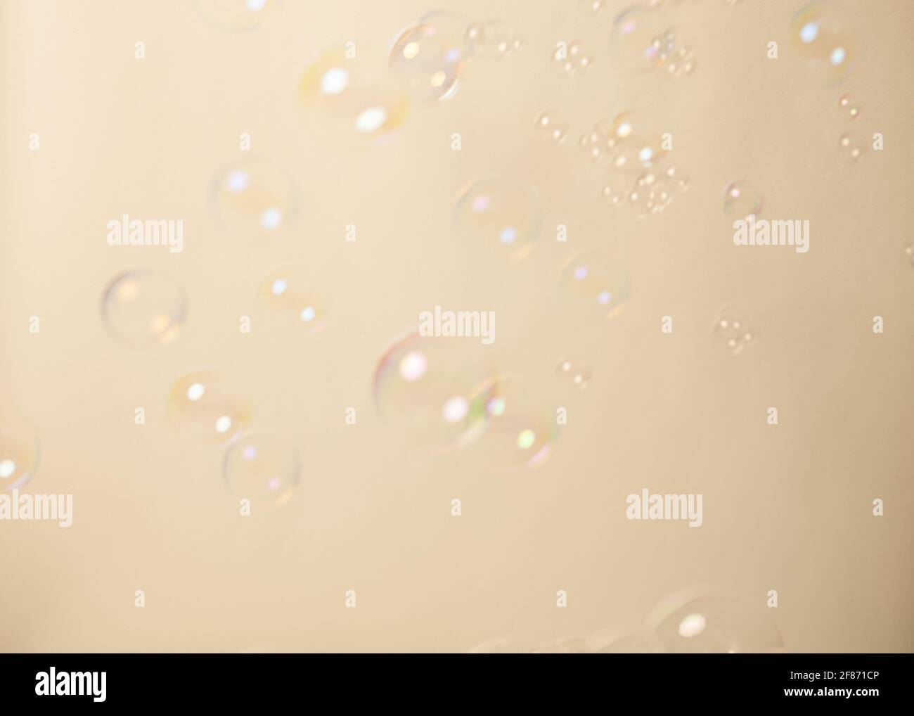Closeup of bubbles on light brown background Stock Photo - Alamy