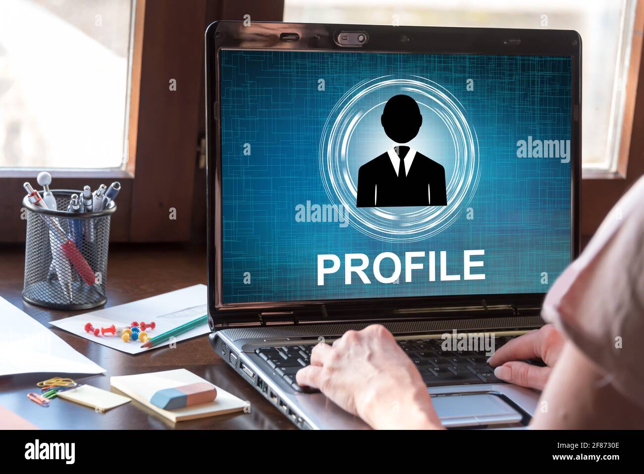 Laptop screen displaying a profile concept Stock Photo - Alamy