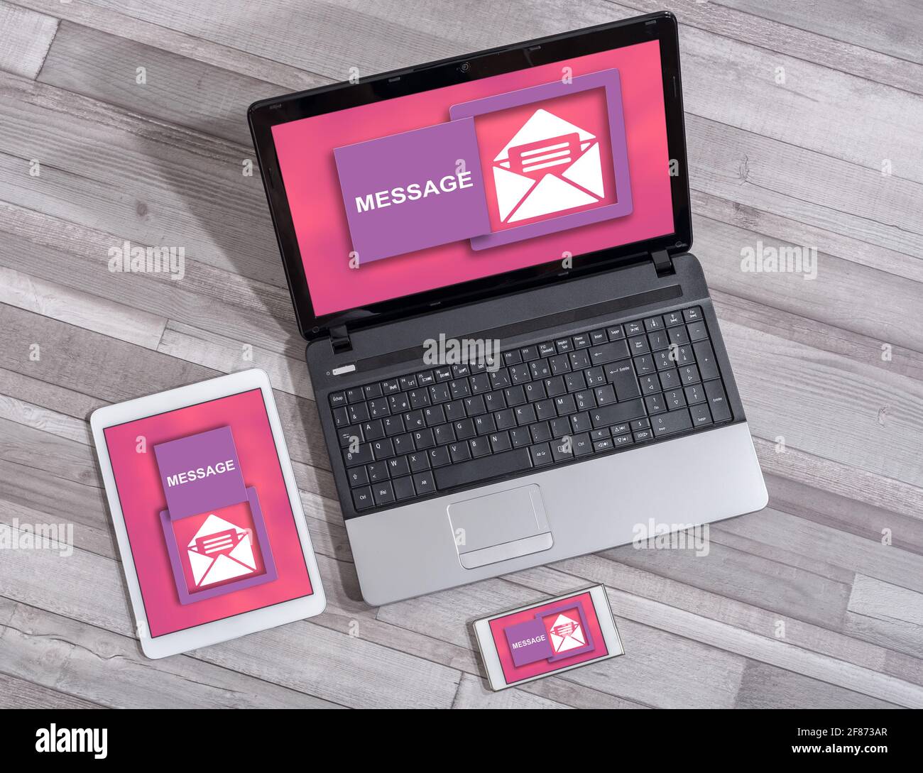 Message concept shown on different information technology devices Stock ...