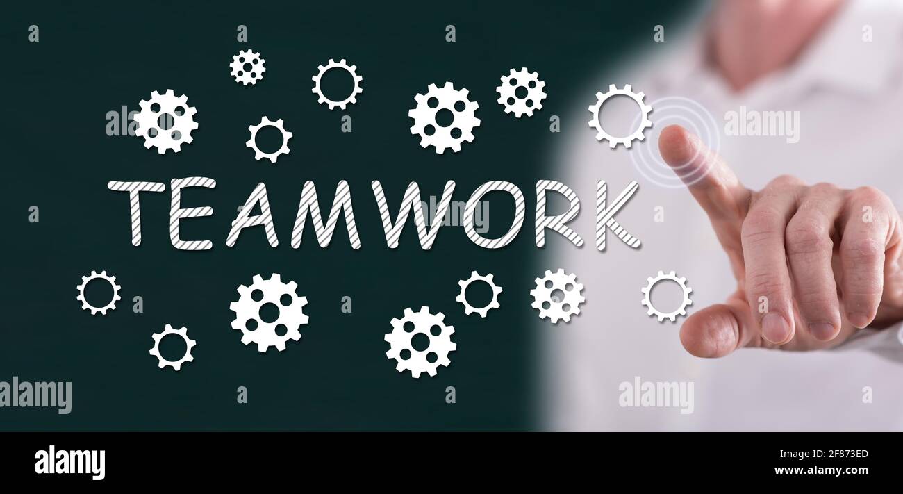 Man touching a teamwork concept on a touch screen with his finger Stock ...