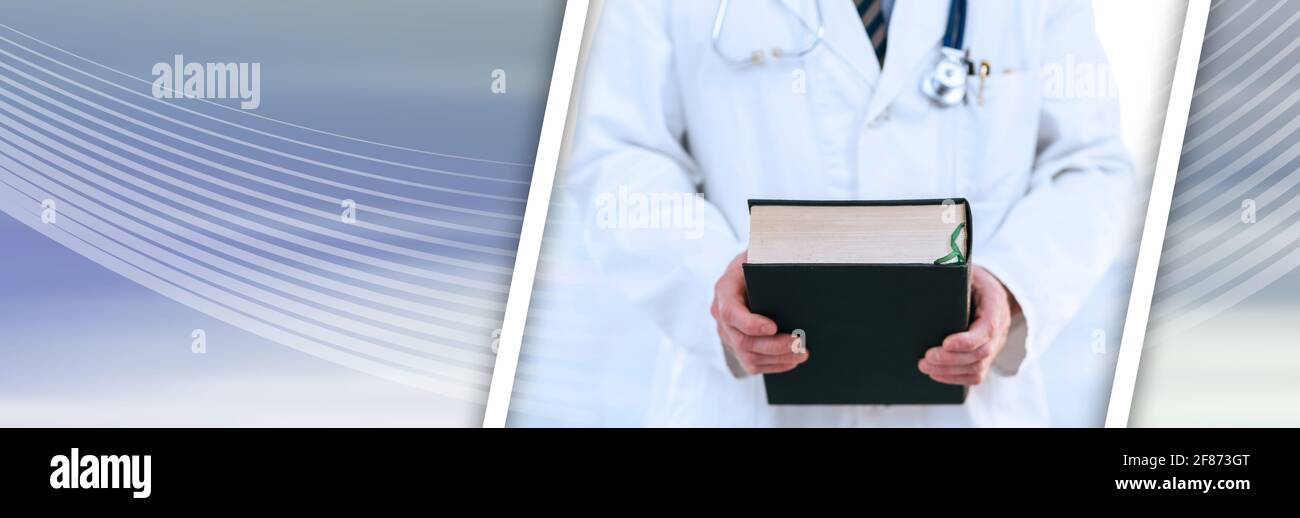 Doctor standing and holding a medical textbook; panoramic banner Stock ...
