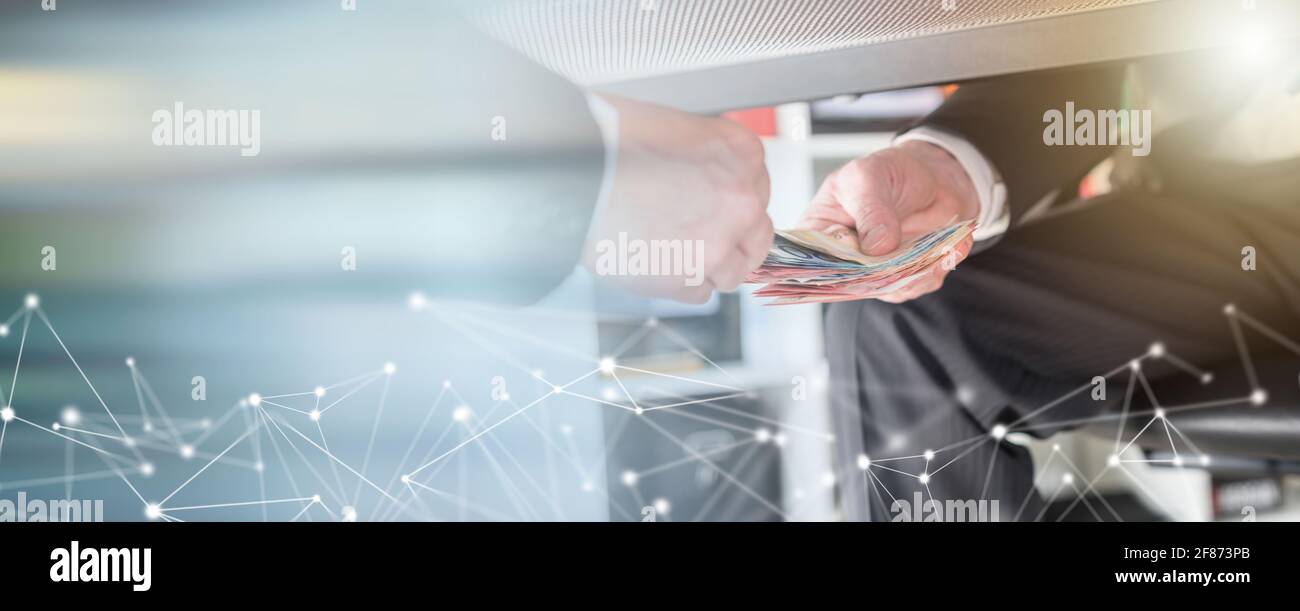Businessman giving money under a table; multiple exposure Stock Photo ...