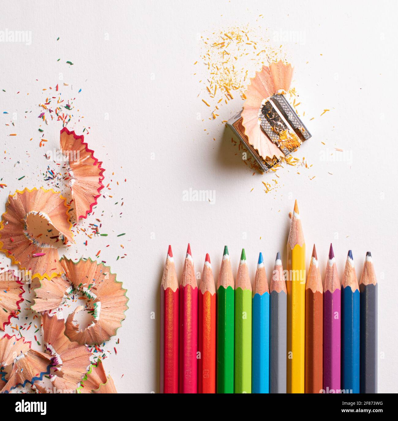 Top view of the colored pencils side by side highlighting the yellow ...