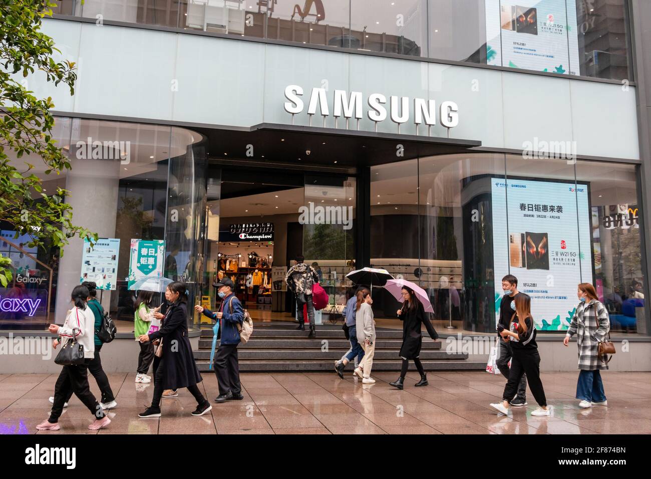 SHANGHAI, CHINA - APRIL 12, 2021 - Pedestrians walk past the flagship ...