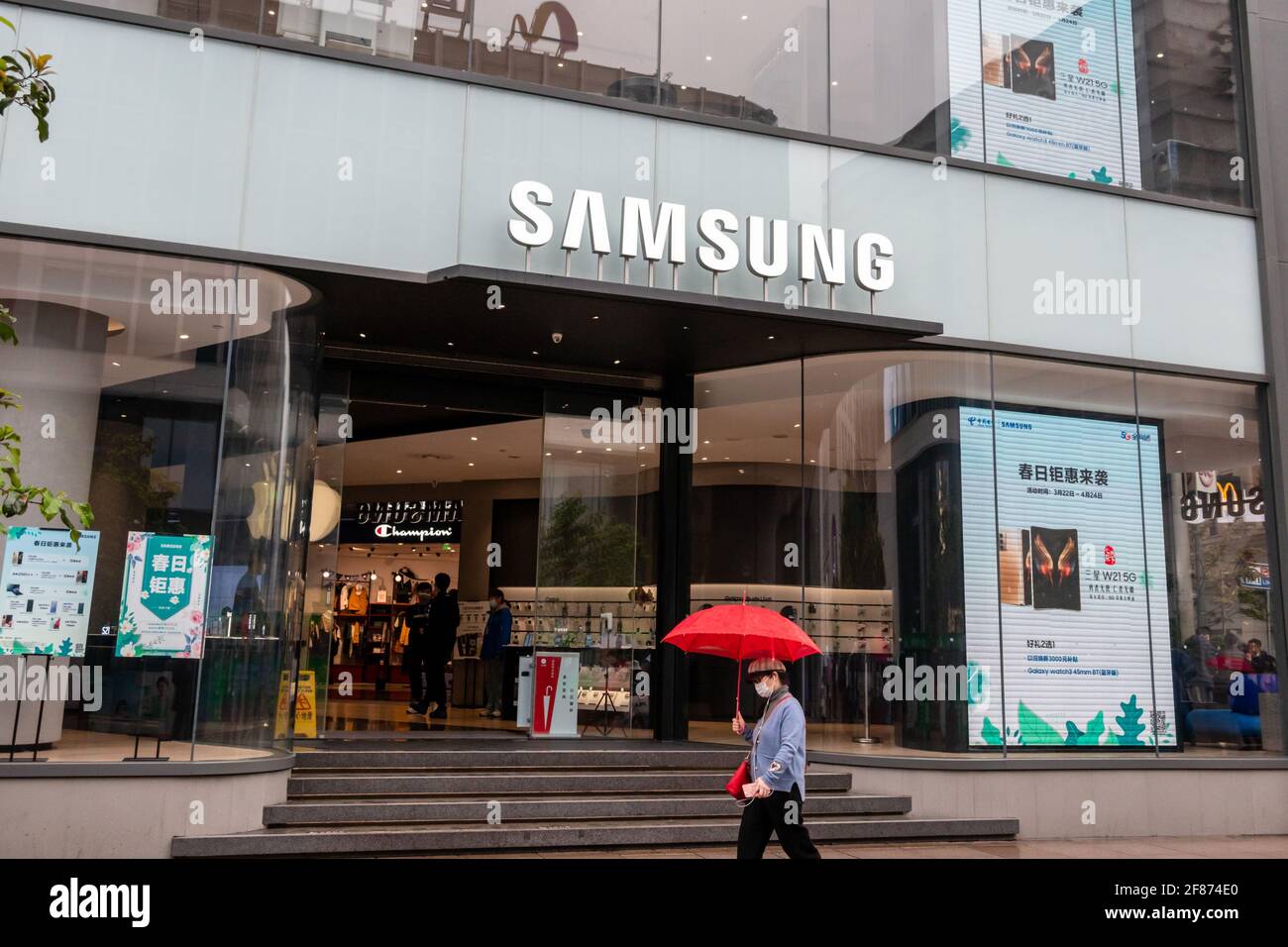 SHANGHAI, CHINA - APRIL 12, 2021 - Pedestrians walk past the flagship ...