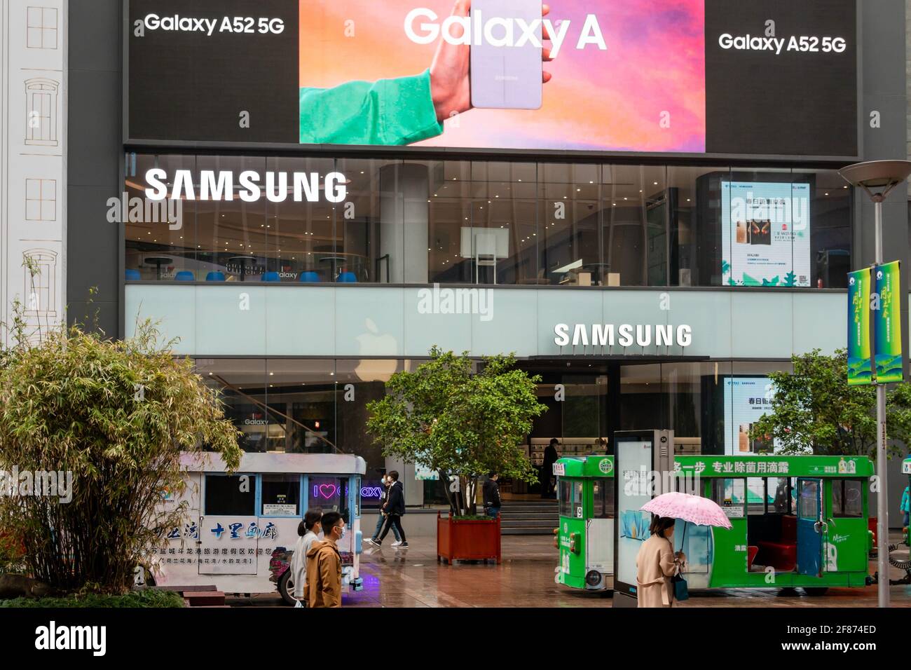 SHANGHAI, CHINA - APRIL 12, 2021 - Pedestrians walk past the flagship ...