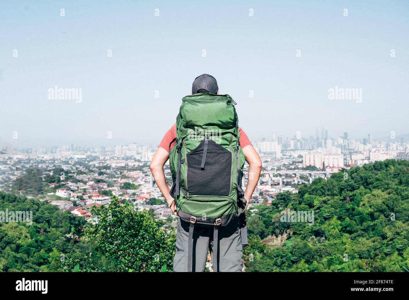 Adventurous man with backpack outdoors Stock Photo - Alamy