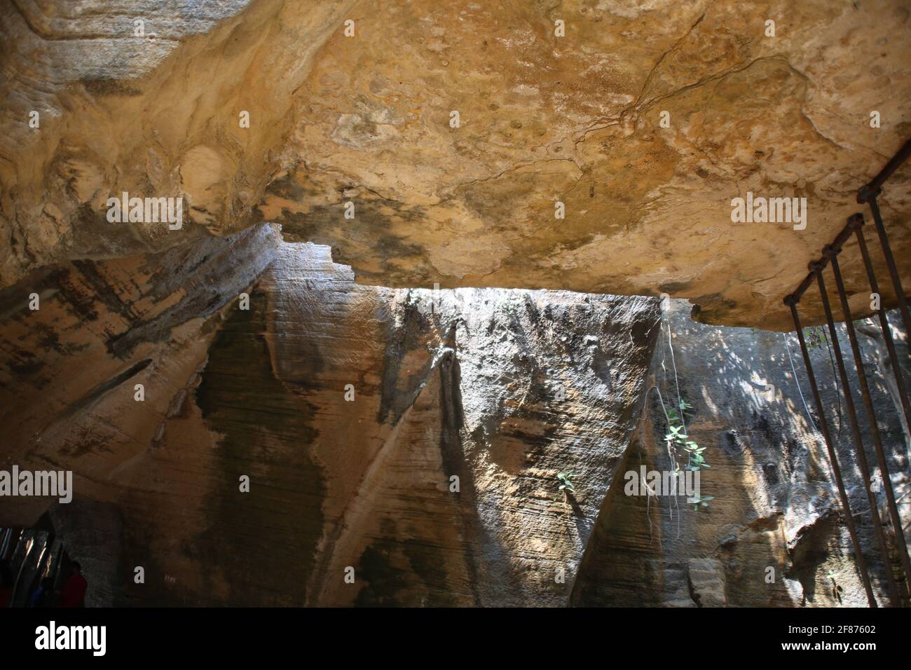 Ancient cave with the sunlight falling on the rocks Stock Photo - Alamy
