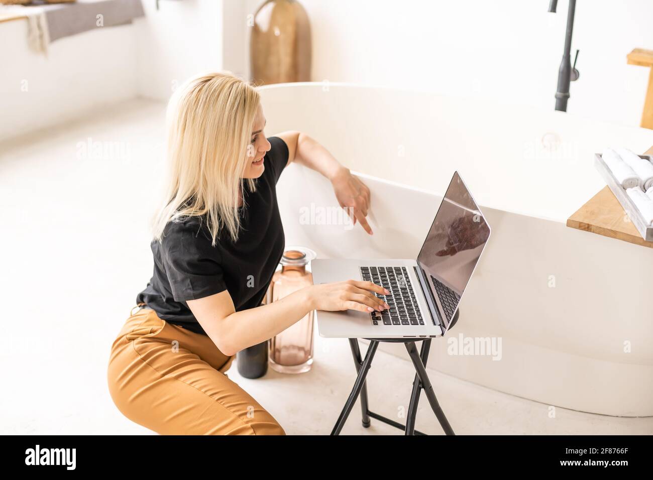 Remote work at home, freelance during covid-19 quarantine. Smiling lady ...