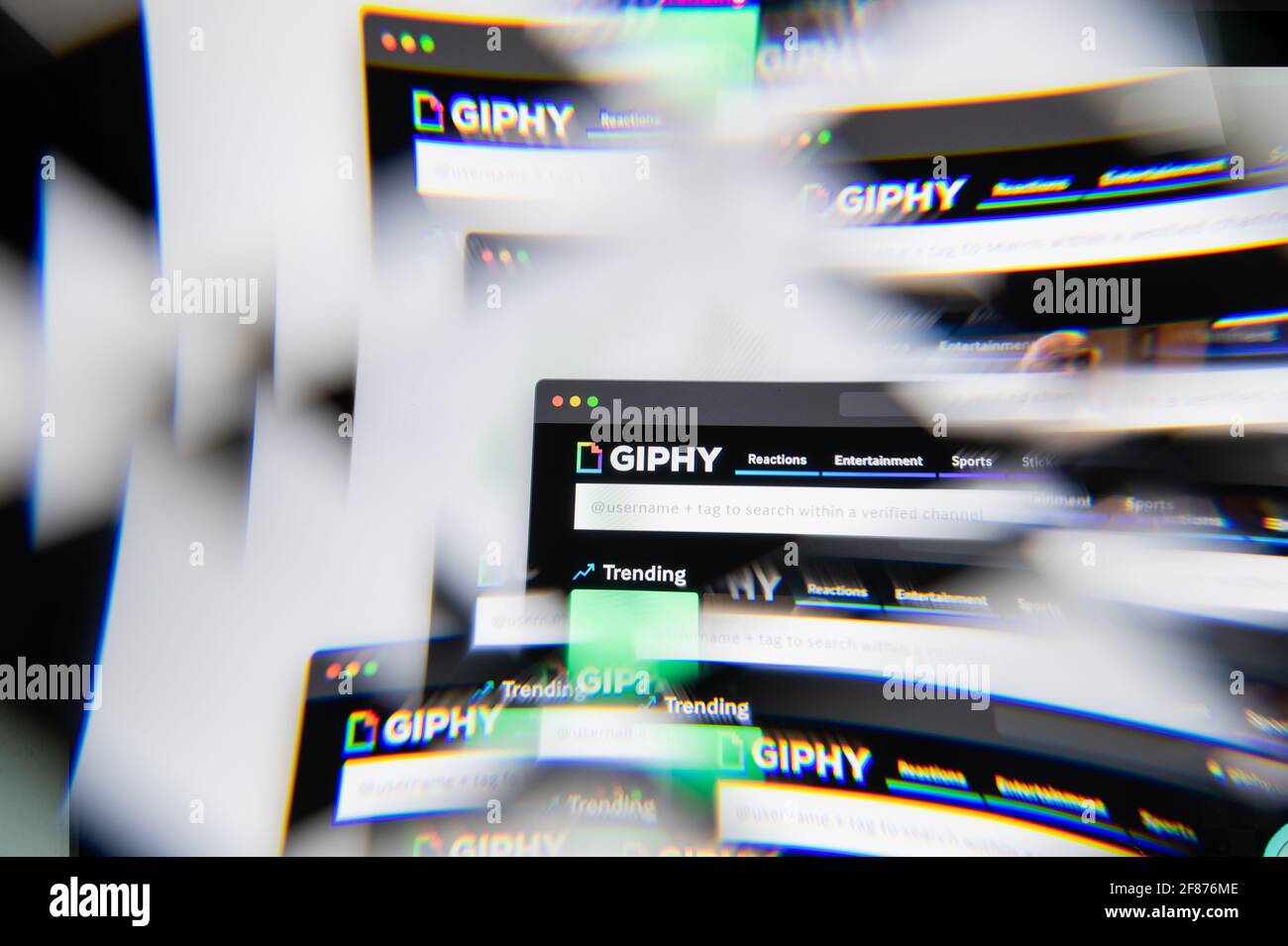 Milan, Italy - APRIL 10, 2021: Giphy logo on laptop screen seen through ...