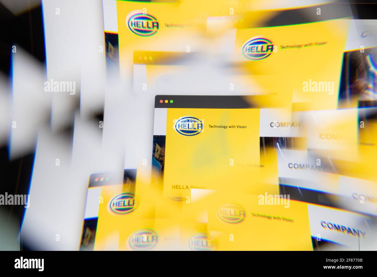 Milan, Italy - APRIL 10, 2021: Hella logo on laptop screen seen through ...
