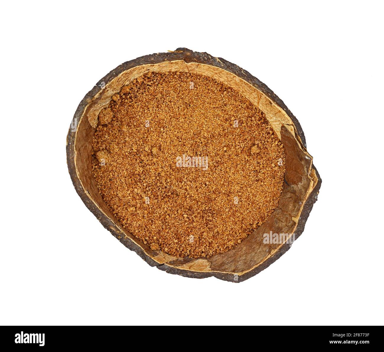 Sweet coconut sugar in coconut shell isolated on white background Stock ...