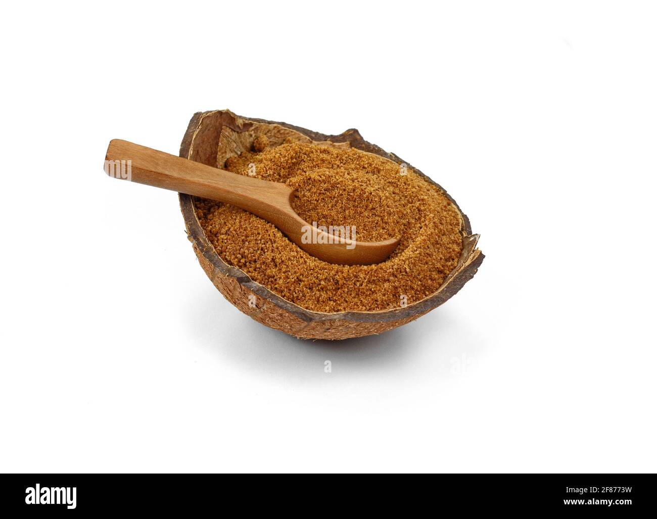 Sweet coconut sugar in coconut shell isolated on white background Stock ...