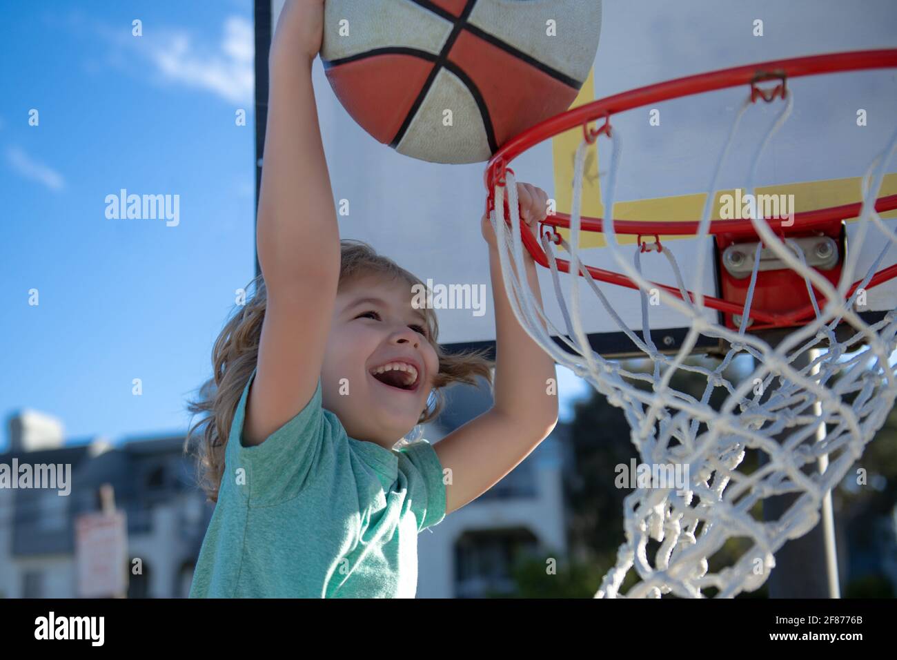 Kids playing basketball. Child sport activity. Funny excited child ...