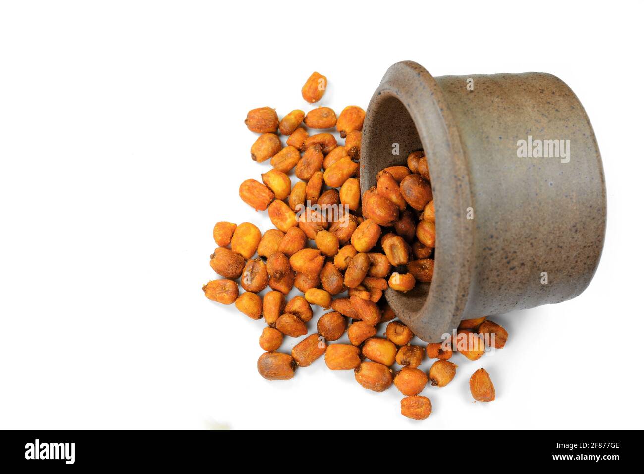 Pile of toasted salted corn in a bowl on a white background. Salted ...