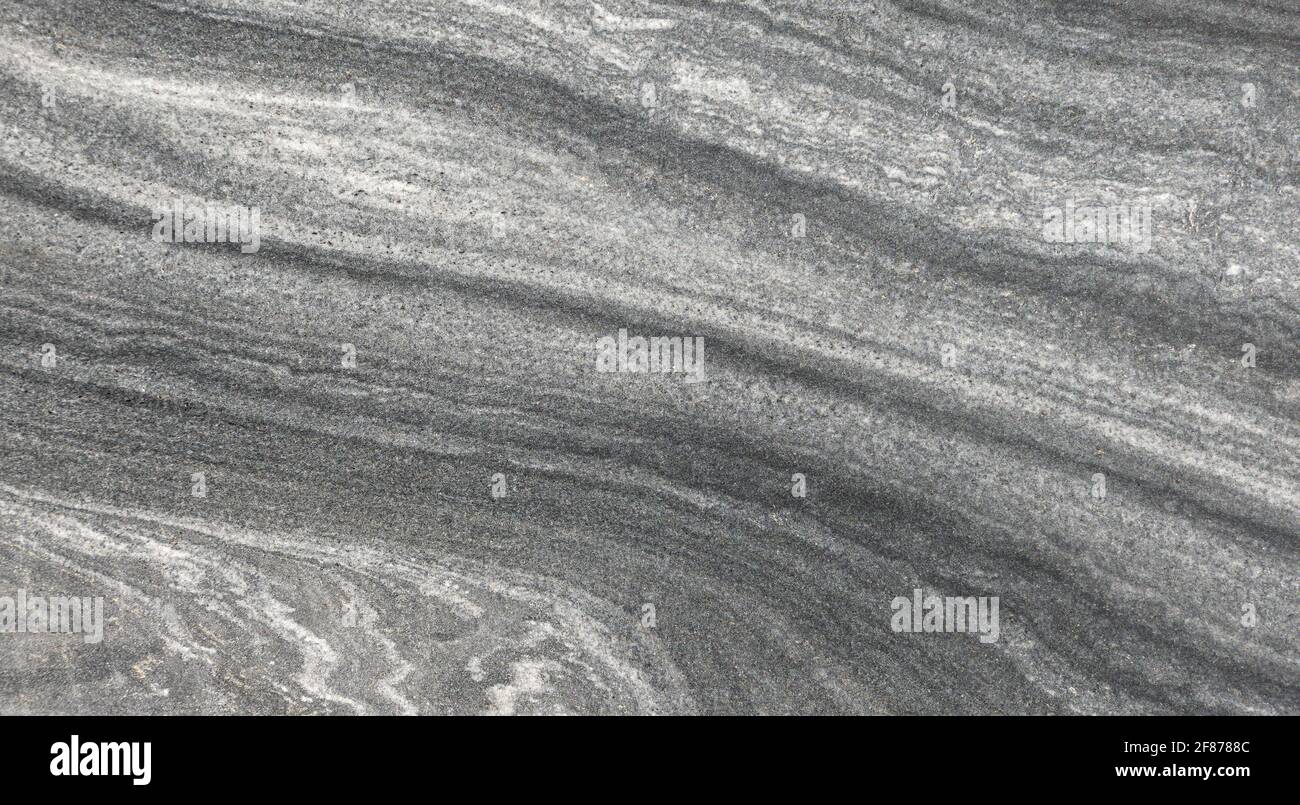 Smooth gray stone slab with abstract pattern in close-up Stock Photo ...