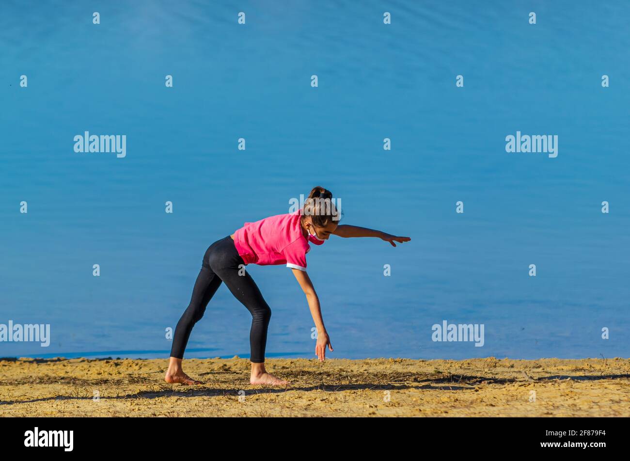 Female cartwheel hi-res stock photography and images - Alamy