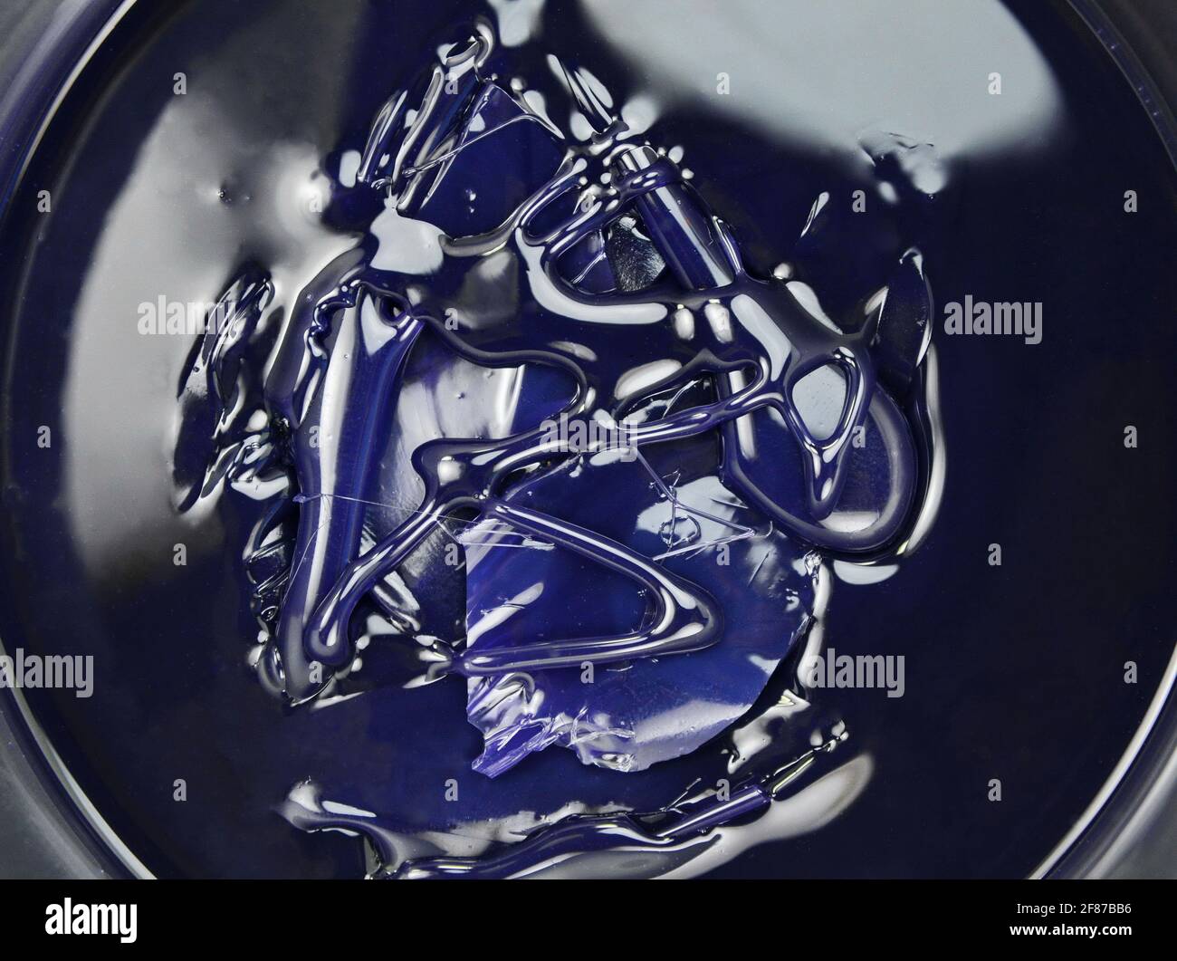 Close-up of depilation wax texture. Dark Melted wax surface texture ...