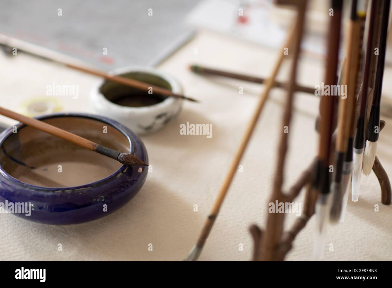 Ink brush and Chinese calligraphy Stock Photo - Alamy