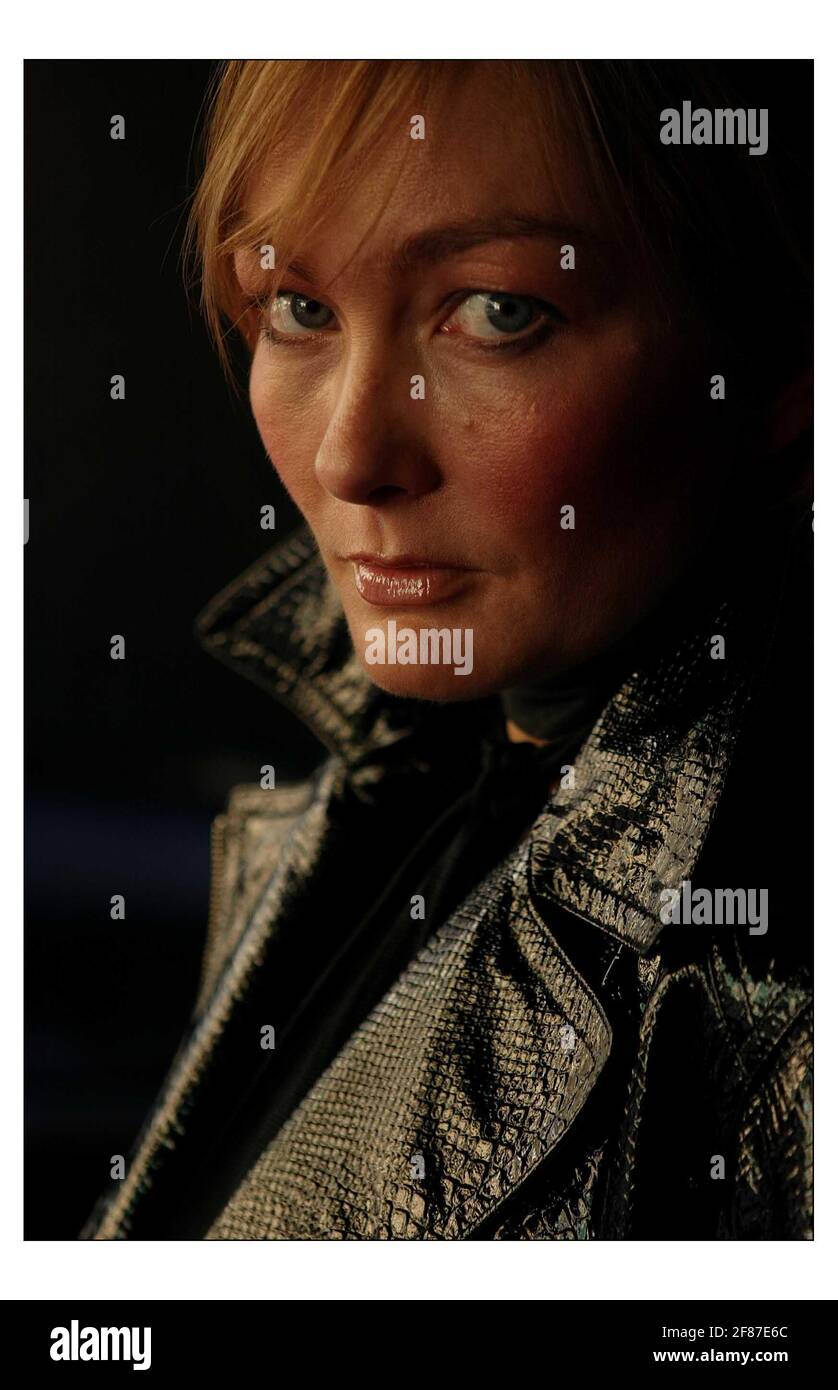 Fiona Knapp in her shop in west London...pic David Sandison 19/2/2004 ...