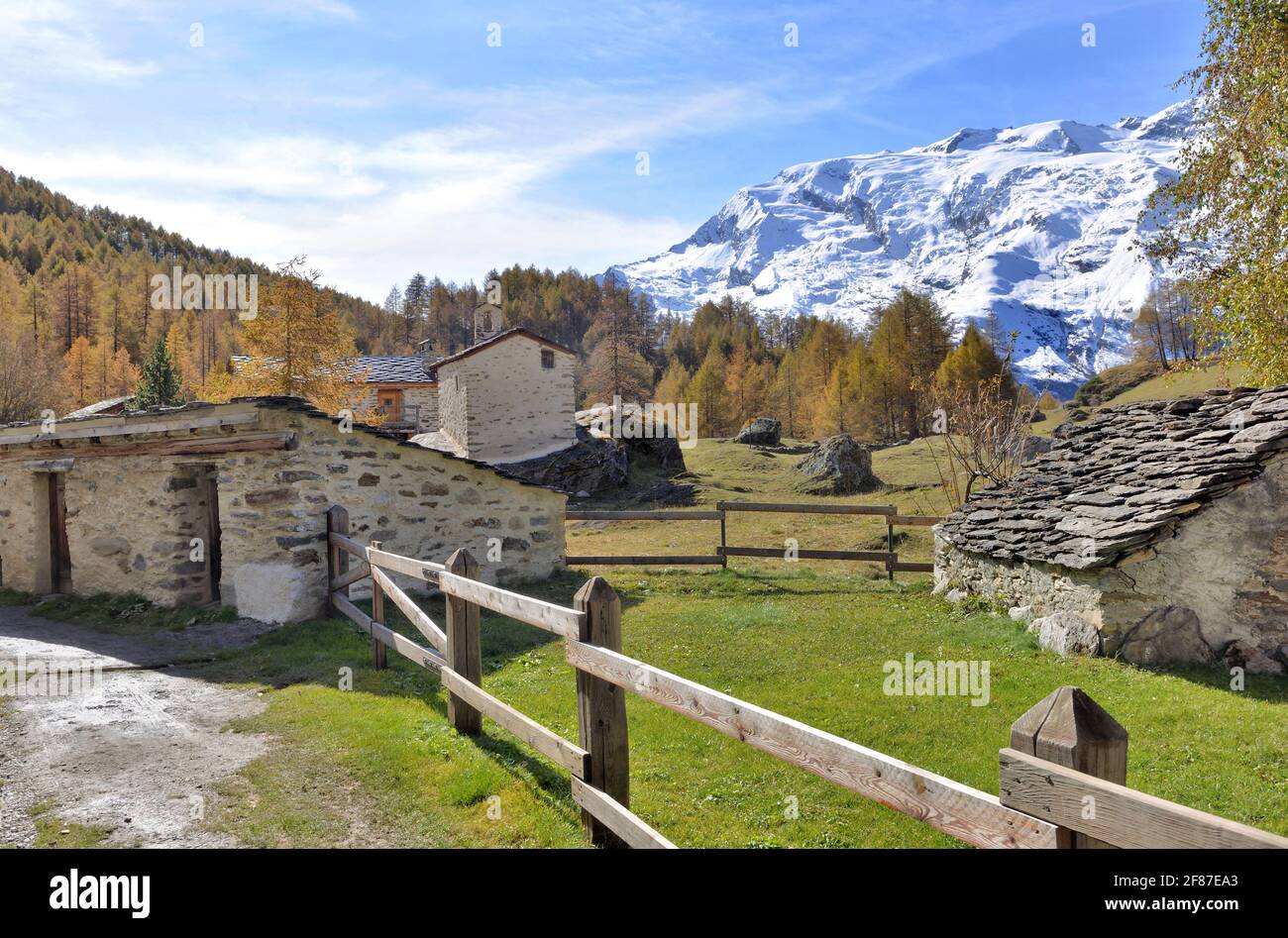authentic and ancient french alpine village in autumnal landscape with ...