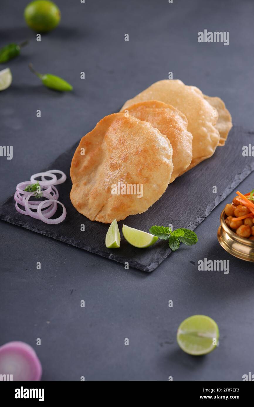 Indian breakfast Poori or puri ,tasty indian dish made using all ...