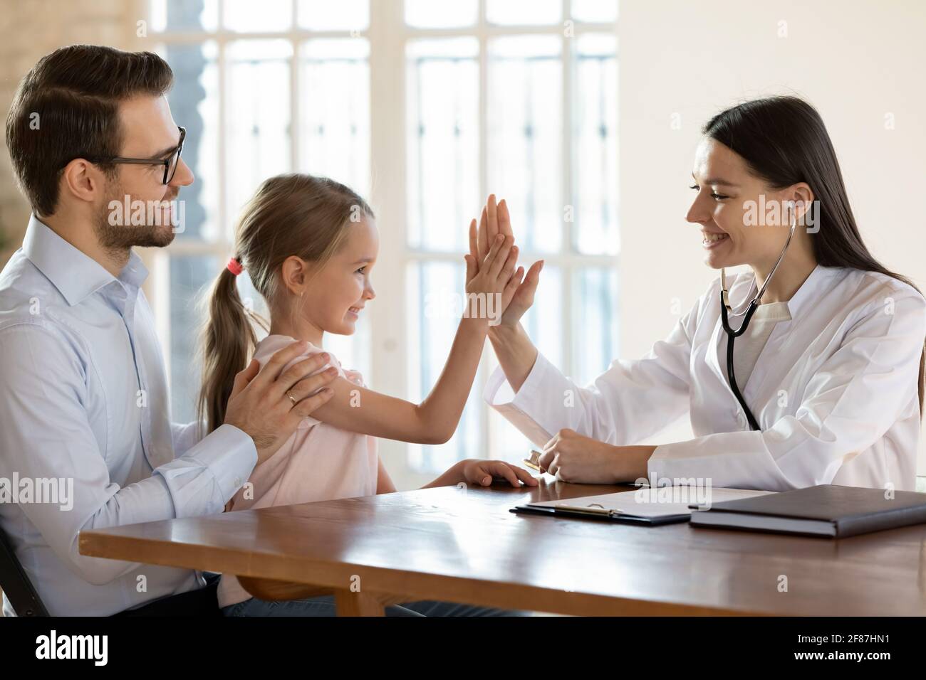 Child high five nurse hi-res stock photography and images - Alamy