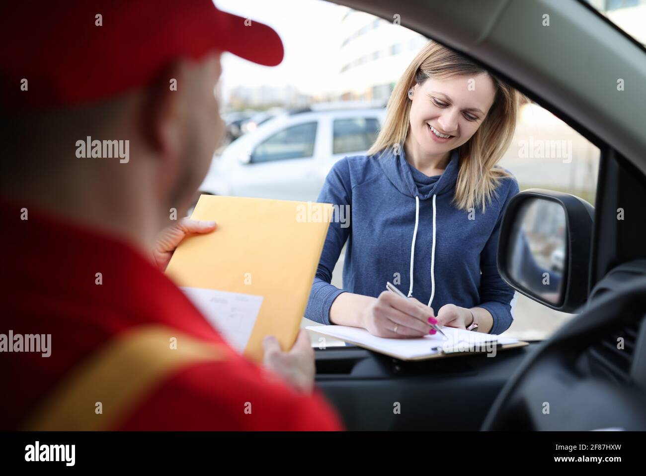 Business woman receiving documents hi-res stock photography and images ...