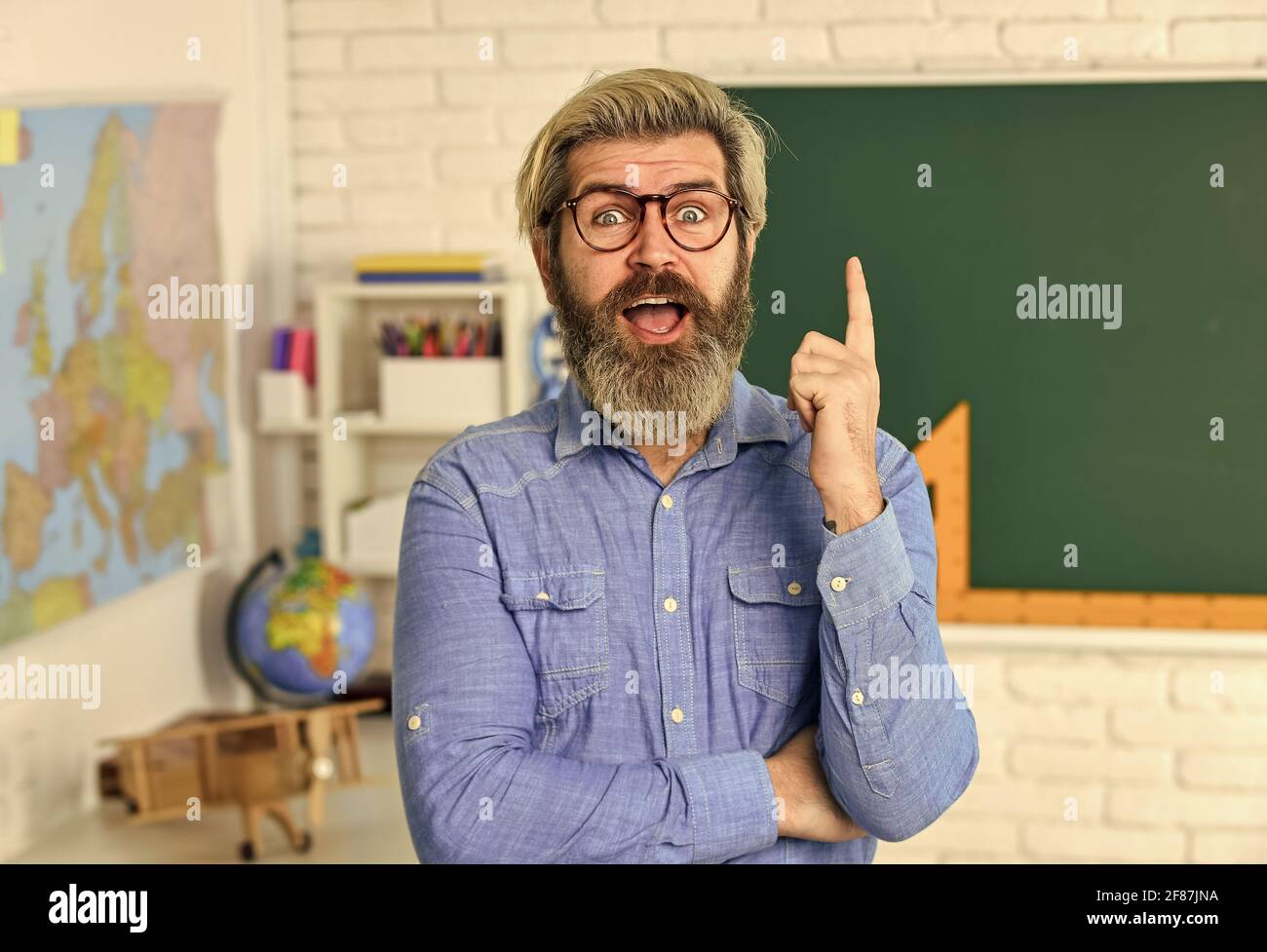Intellectual task. Back to school. Mature bearded man in glasses ...