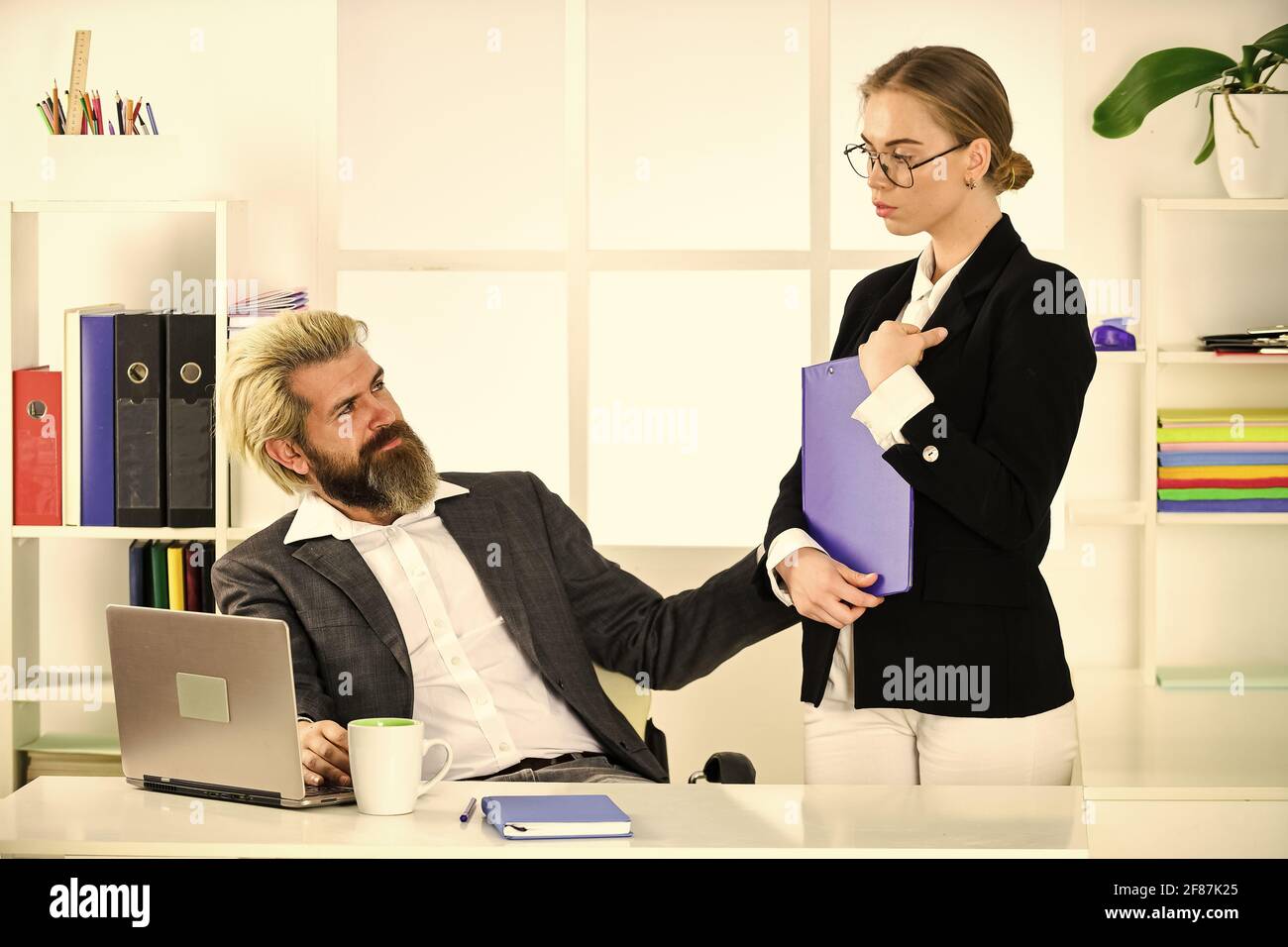 boss and employee. successful partnership. man and woman brainstorming ...
