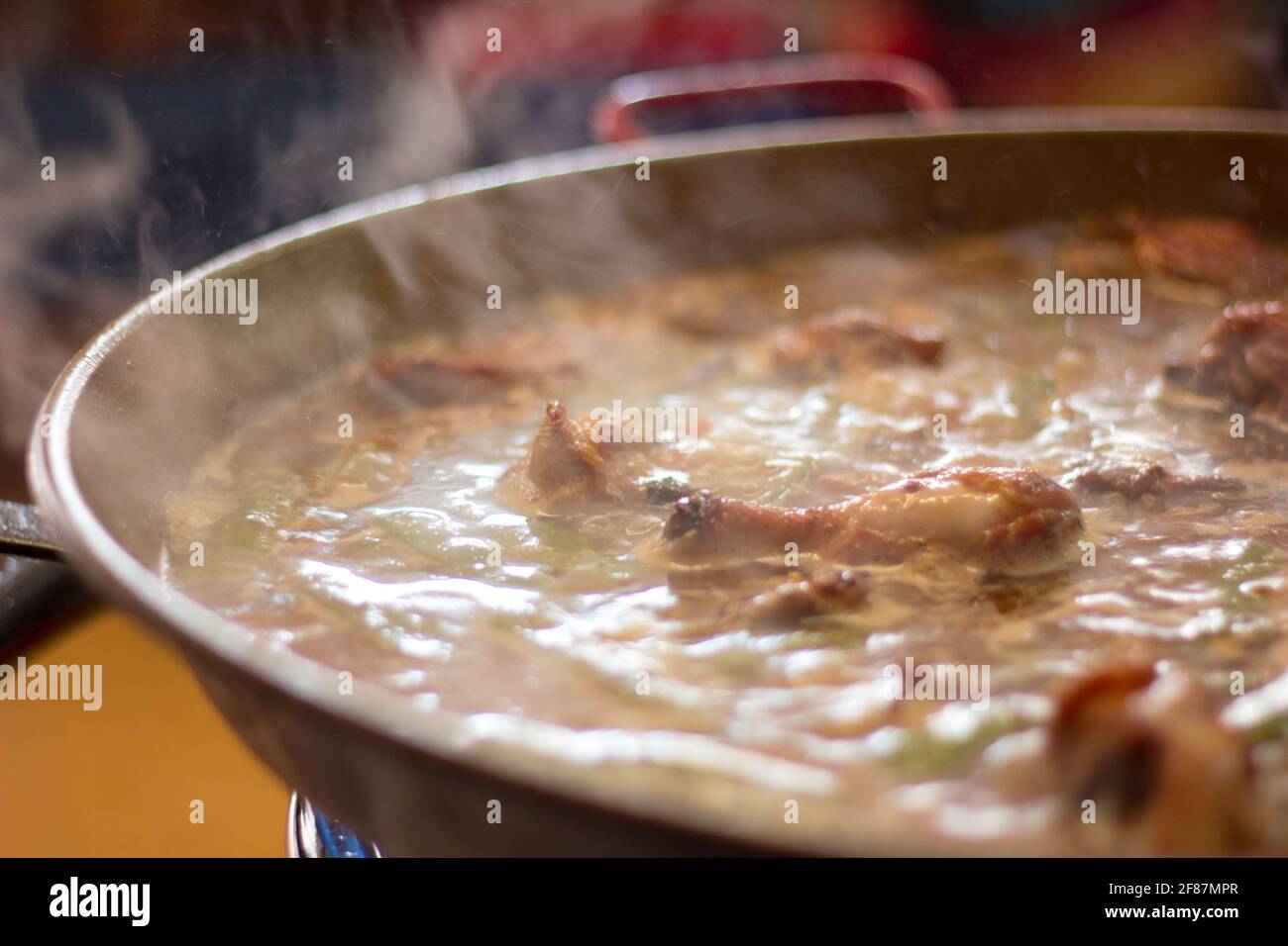 Paella being cooked. Traditional spanish food. Valencia, Spain Stock ...