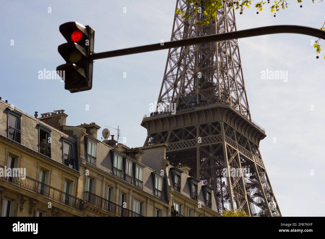 Red traffic light in front of the Eiffel Tower in Paris, France Stock ...