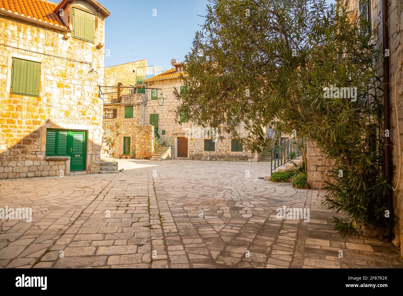 Old street without tourists in Stari Grad, Croatia Stock Photo - Alamy