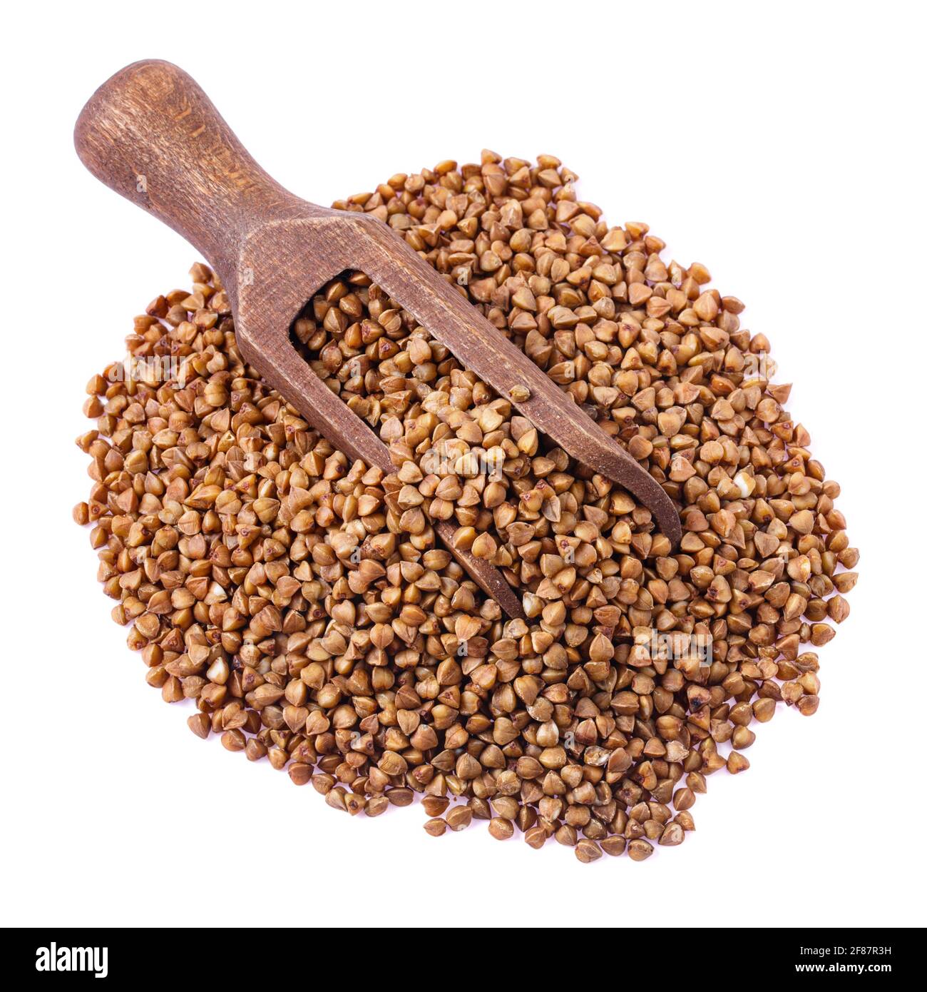 Scoop of buckwheat grain isolated on white Stock Photo - Alamy