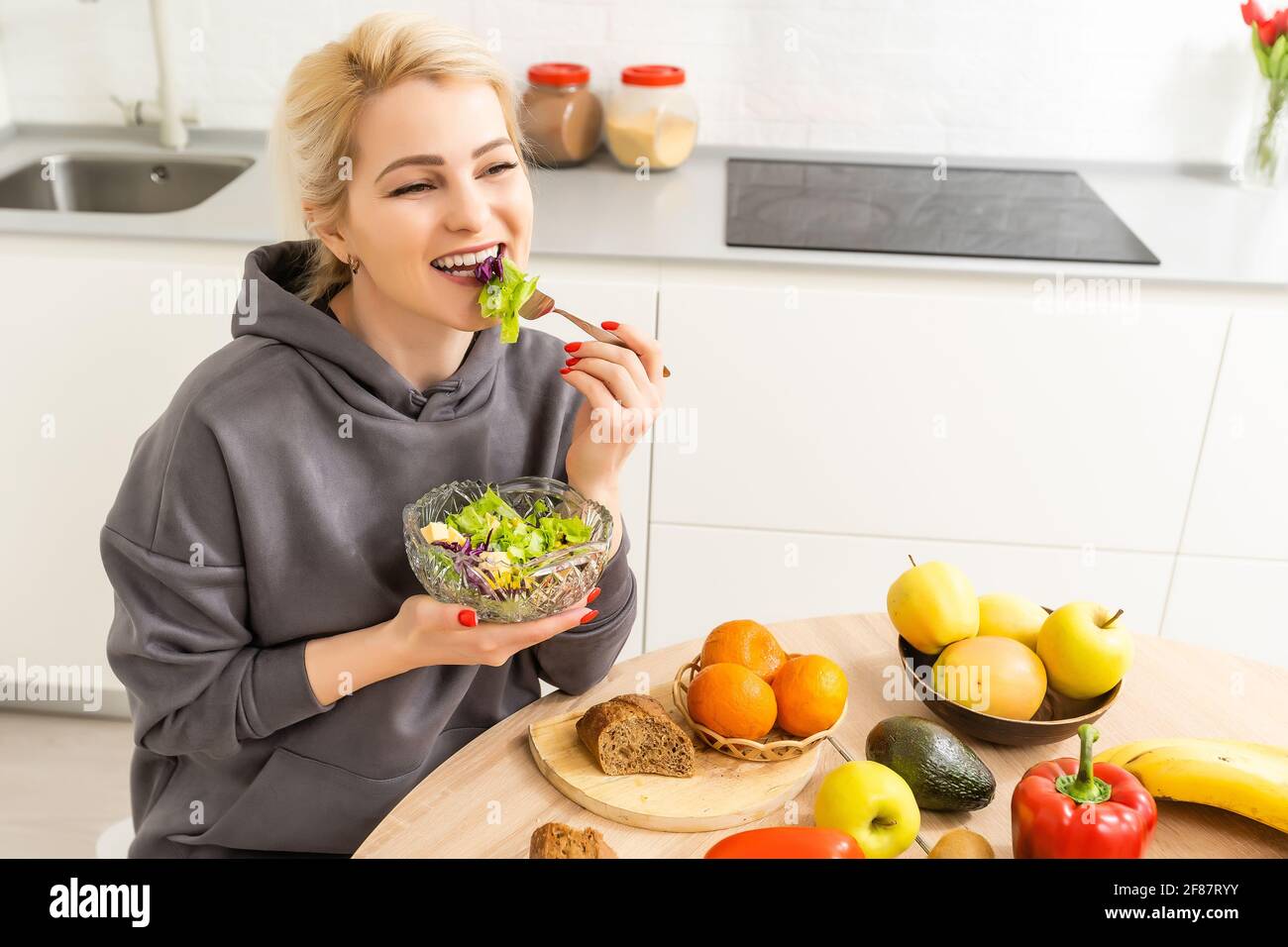 Healthy food. Woman preparing fruits and vegetables Stock Photo - Alamy