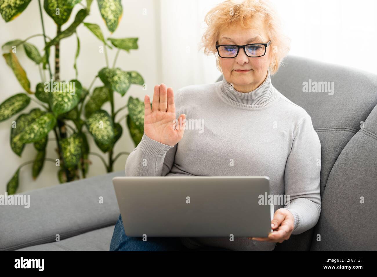 Video call good looking elderly hi-res stock photography and images - Alamy