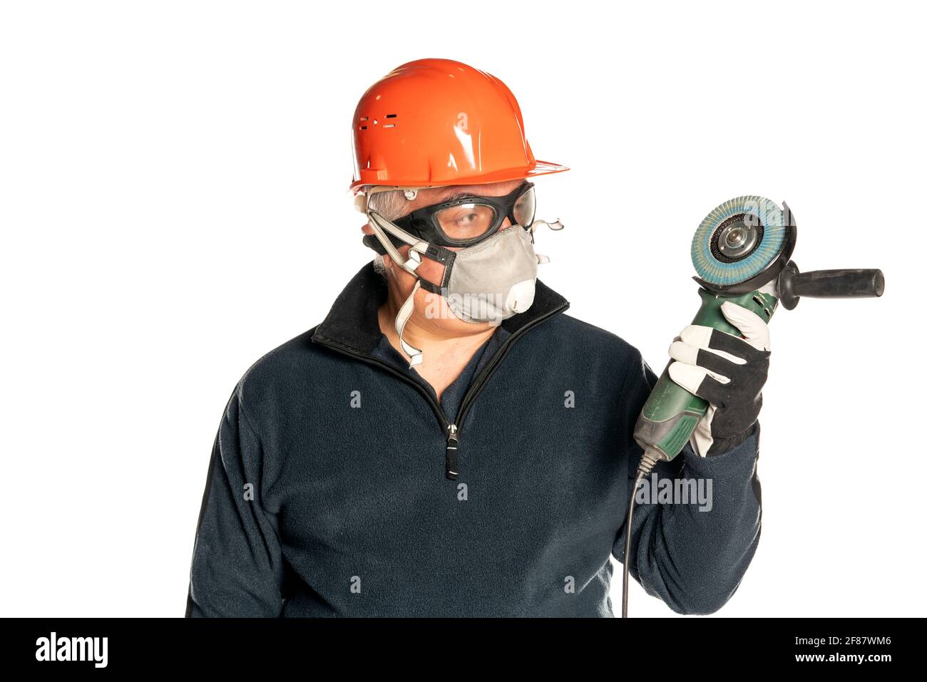 man with angle grinder and protective equipment on white background ...