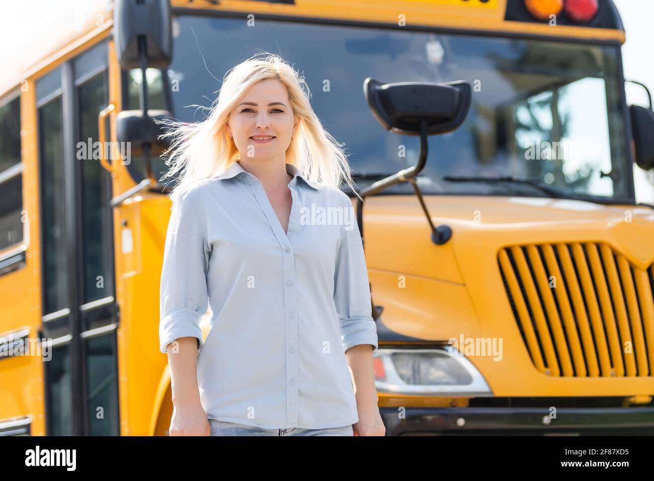 Children talking school bus hi-res stock photography and images - Alamy