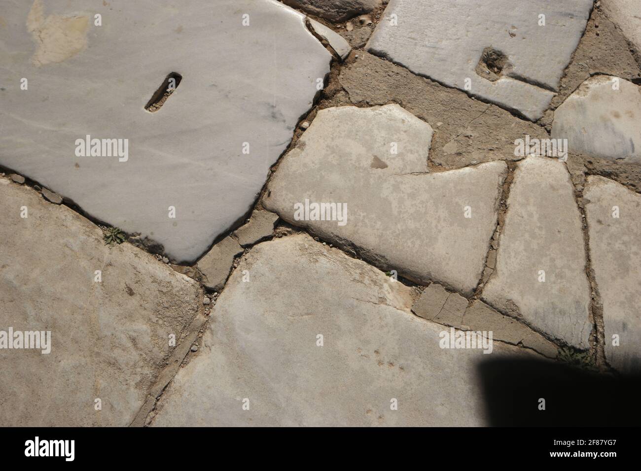 Abstract background of old marble cobblestone pavement Stock Photo - Alamy