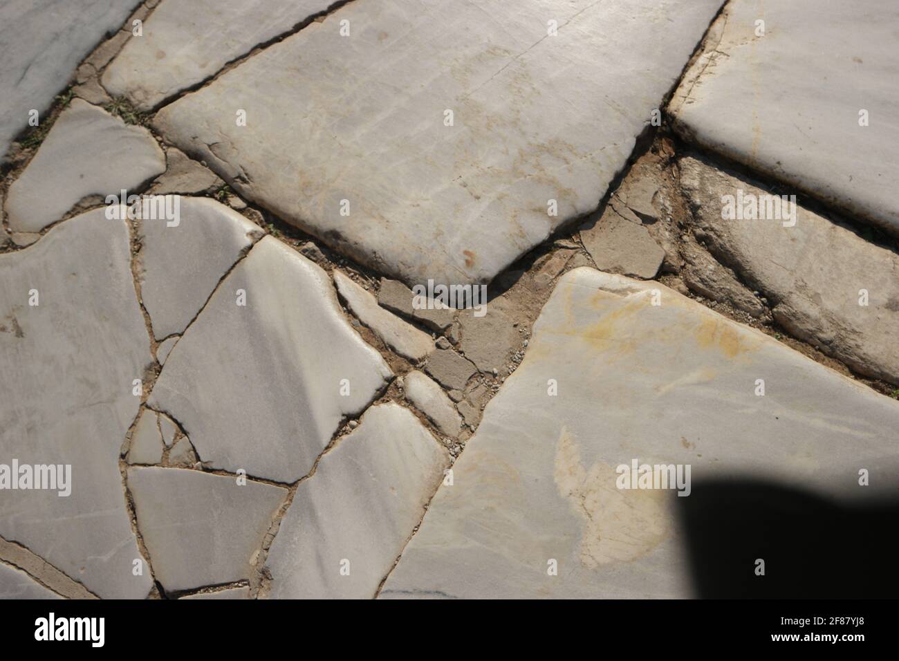 Aged marble pavement close up. Old marble road Stock Photo - Alamy